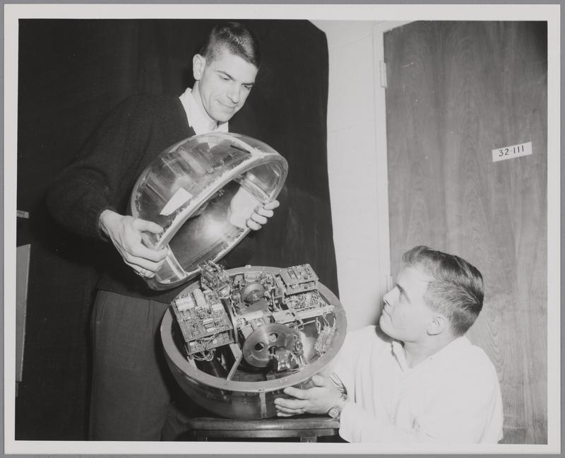 Ronald W. Cornew and James K. Roberge with space vehicle attitude ...