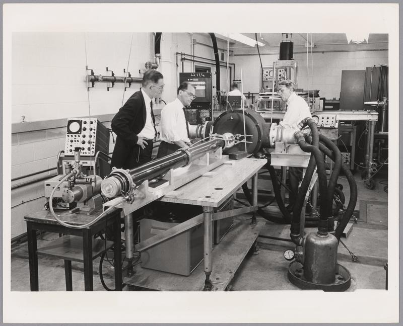 Benjamin Lax, Kenneth Button, and H.A. Gebbi with unidentified ...