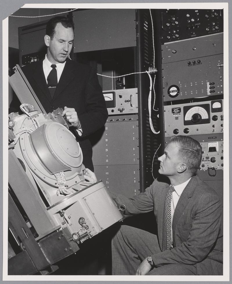 Ralph Roland Ragan and David Hoag work with the Mark 1 guidance module ...
